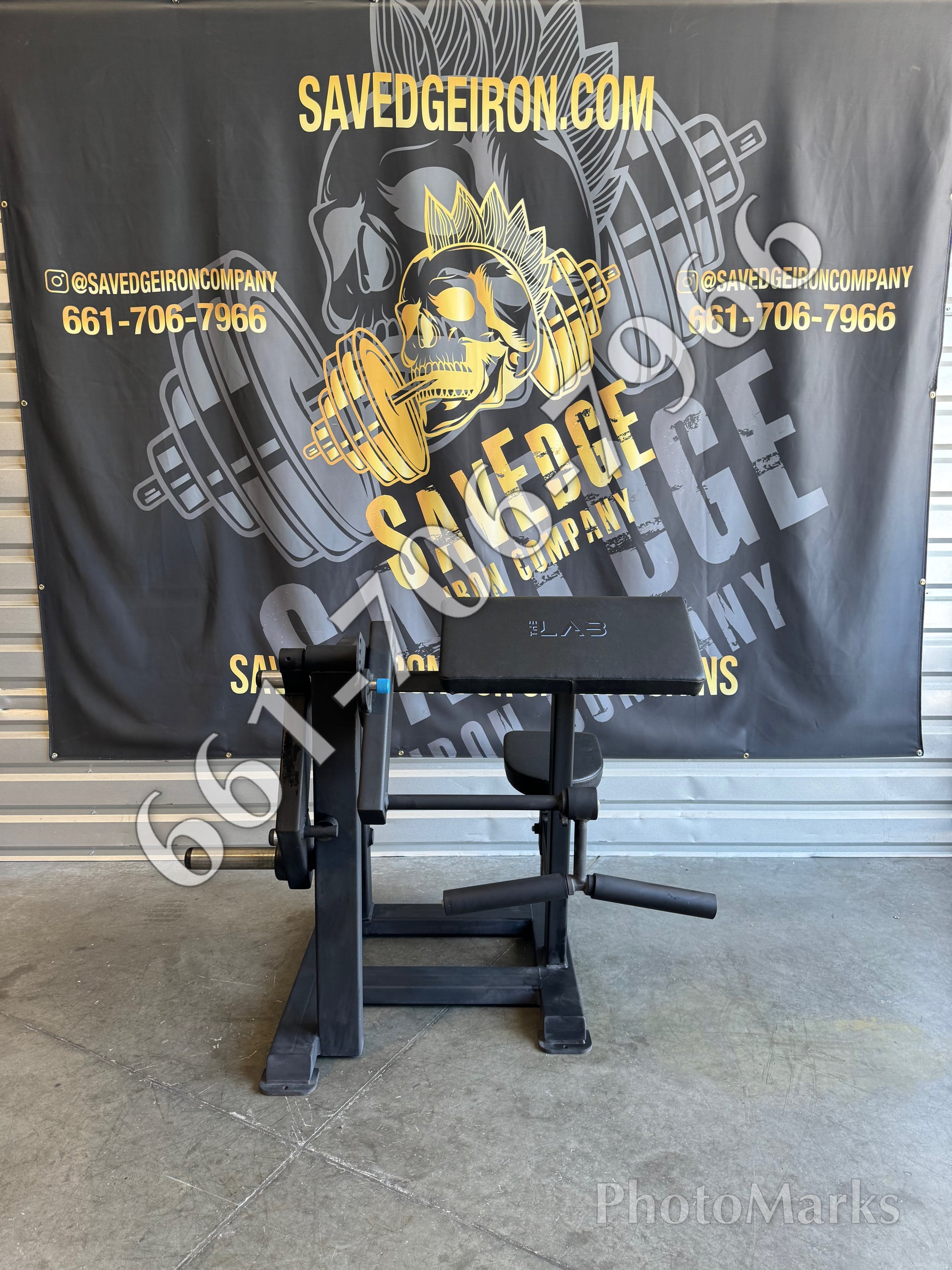 Watson Plate Loaded Bicep Curl – Savedge Iron Company